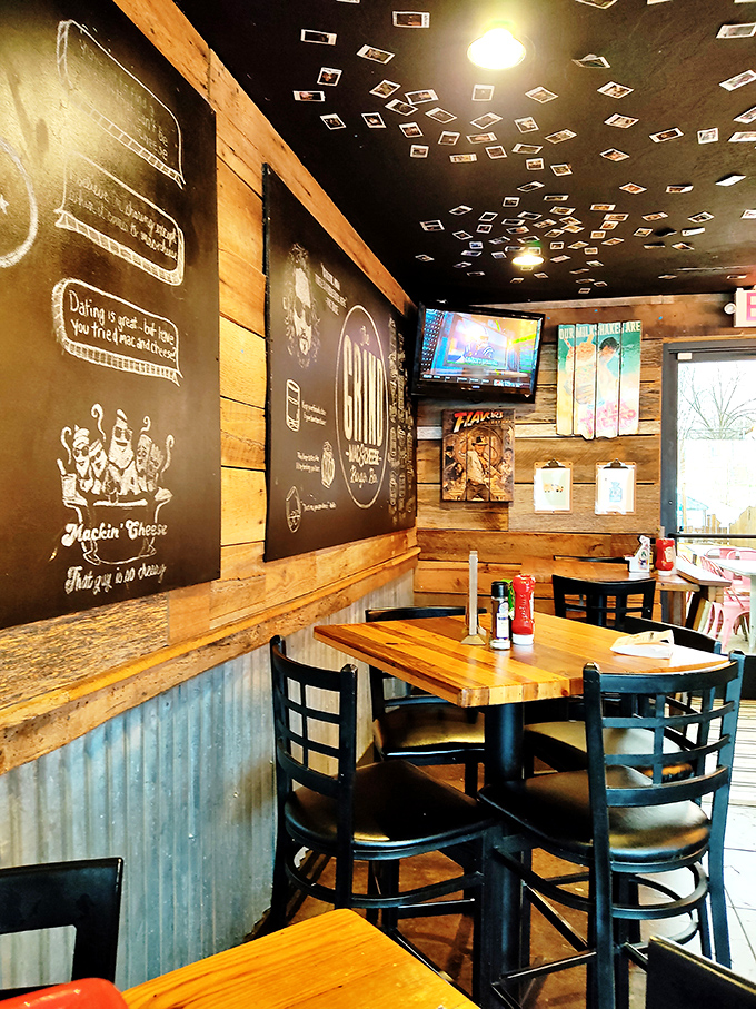 That ceiling of memories! The Grind's interior combines rustic wood, industrial metal, and a galaxy of polaroids that tell stories of good times past.