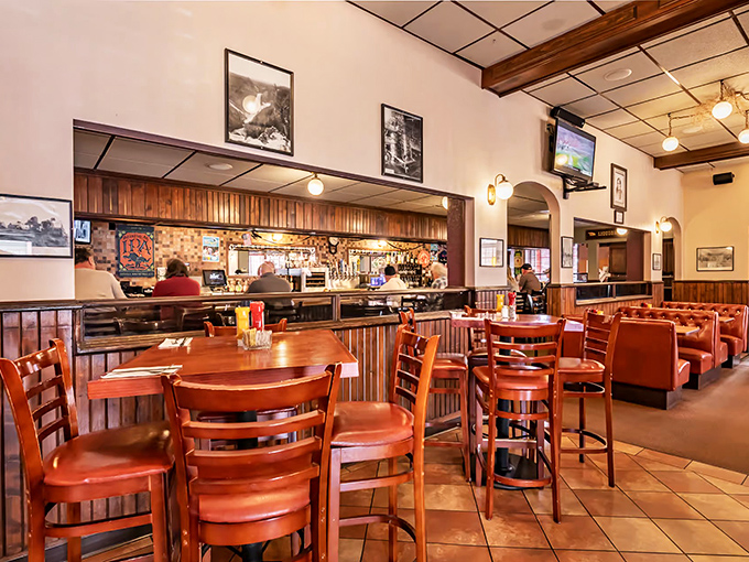 Cozy booths and warm lighting set the stage for culinary adventures. It's like your grandma's kitchen got a swanky makeover!