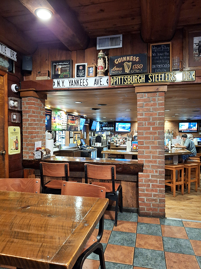 Step into a time capsule of Americana. The interior of Denny's is a cozy collision of sports memorabilia, beer signs, and the promise of epic meals.