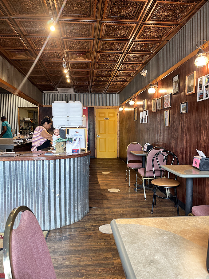 Step inside and feast your eyes on the BBQ temple's inner sanctum. That ornate ceiling? It's watching over your impending food coma.