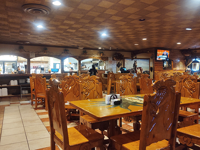 Step into a Southwestern time capsule! These carved wooden chairs aren't just seats; they're your ticket to a rootin' tootin' flavor rodeo.