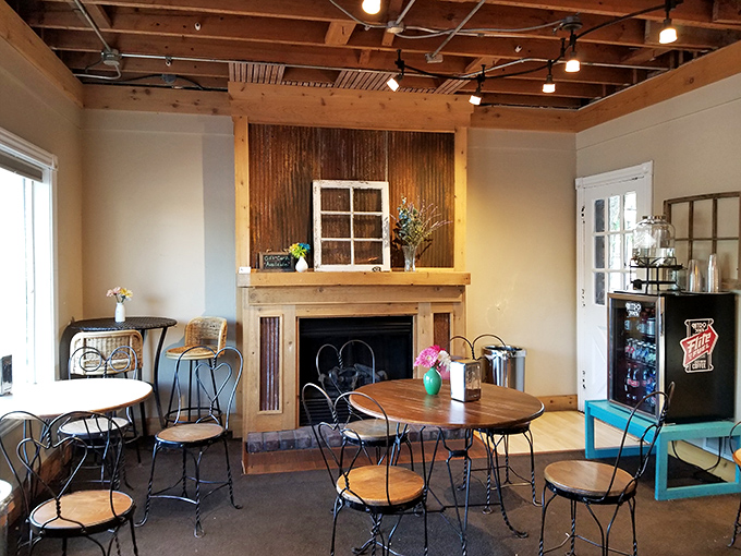 Step inside and feel the warmth. This cozy interior is like a hug for your taste buds, complete with a fireplace for those chilly Kansas evenings.
