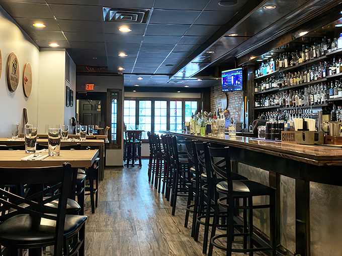 Step into a burger lover's dream. This cozy interior blends rustic charm with modern flair, setting the stage for culinary adventures.