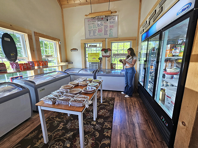 Pie heaven awaits! This cozy interior is where dreams come true, and diets go to die. It's like Willy Wonka's factory, but for grown-ups who prefer flaky crusts to chocolate rivers.