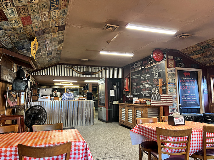 Step into a time machine of taste! The interior is a charming collision of rustic chic and barbecue memorabilia.