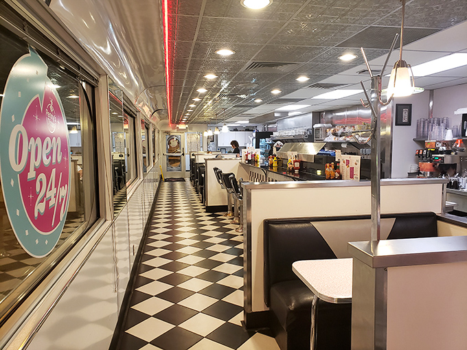 Step into a checkerboard dream! Penny's interior is a retro wonderland where Elvis could stroll in any minute, ready for a milkshake.