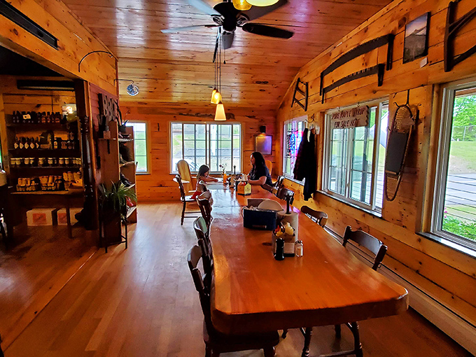 Step inside and you're transported to a cozy log cabin where the aroma of smoky goodness mingles with warm hospitality.