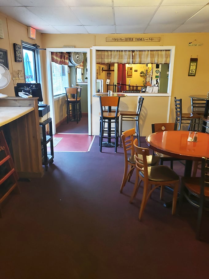 Step into a cozy time capsule where comfort food reigns supreme. This charming interior feels like grandma's kitchen got a quirky makeover.