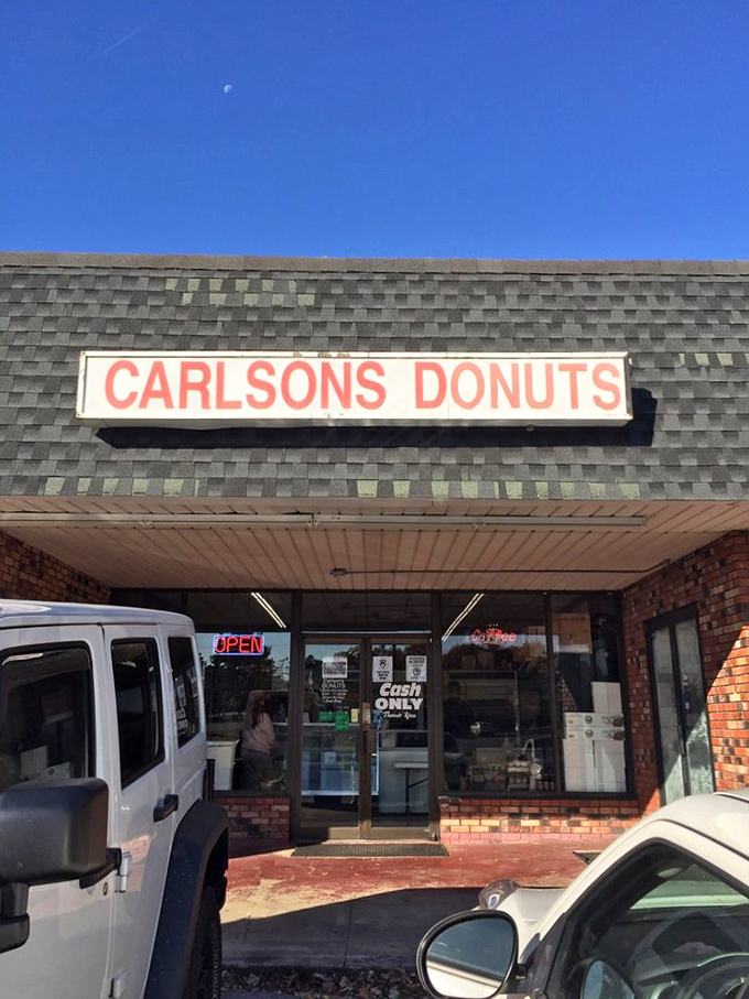 Step into a time machine of taste! Carlson's interior is a charming throwback to simpler times, when calories were just numbers and joy came glazed.