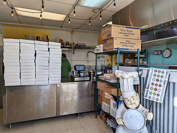 Forget fancy frills &ndash; this cozy kitchen is where the magic happens. Bonus points for the chef statue keeping watch!