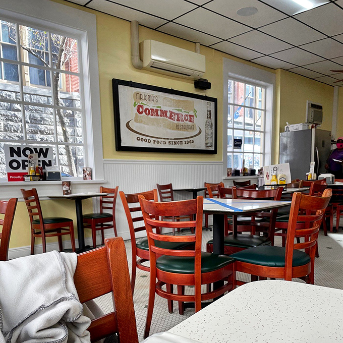 Step into a time capsule of comfort! This cozy interior whispers tales of countless cups of coffee and hearty meals shared over decades.