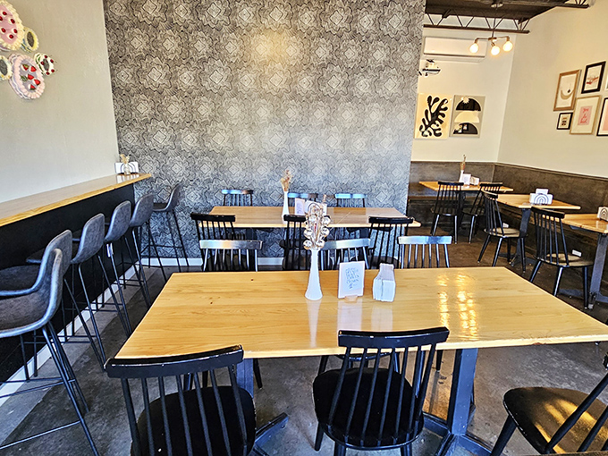 Step into a world where modern meets cozy. The interior of Little Bread Company is a perfect blend of industrial chic and warm, inviting charm.