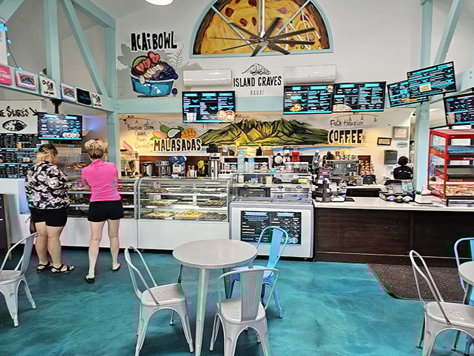 Step into a world where donuts reign supreme. The interior of Island Craves is a kaleidoscope of colors and temptations.