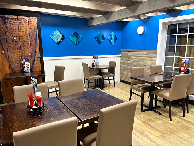 Step inside and feel the ocean breeze (okay, it's air conditioning). La La Lobster's interior is a cozy haven of nautical charm and comfort.