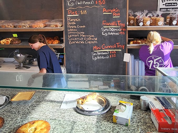 Donut nirvana awaits! This display case is the stuff of Homer Simpson's dreams, a kaleidoscope of glazed, frosted, and powdered perfection.