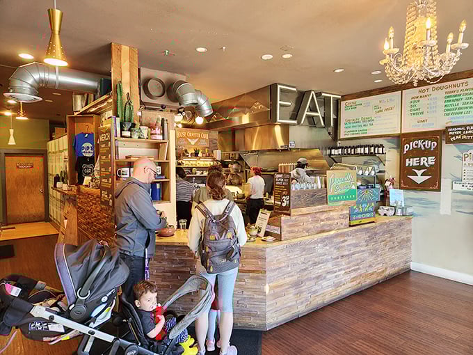 Step into a world where chandeliers and donuts coexist. It's like Versailles, but with better snacks and friendlier staff.