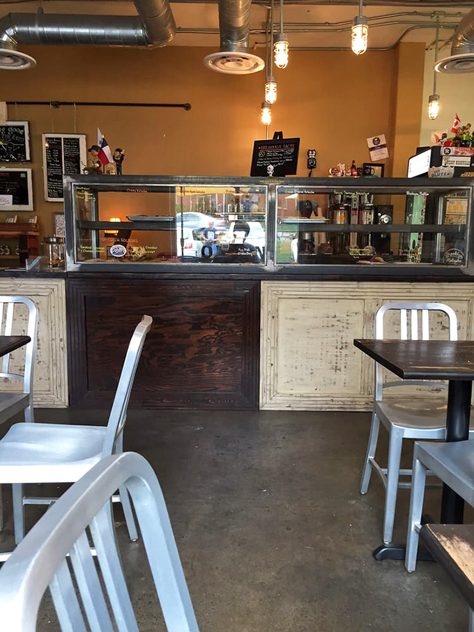 Step into a world where industrial chic meets grandma's kitchen. This cozy interior invites you to linger over coffee and kolaches.