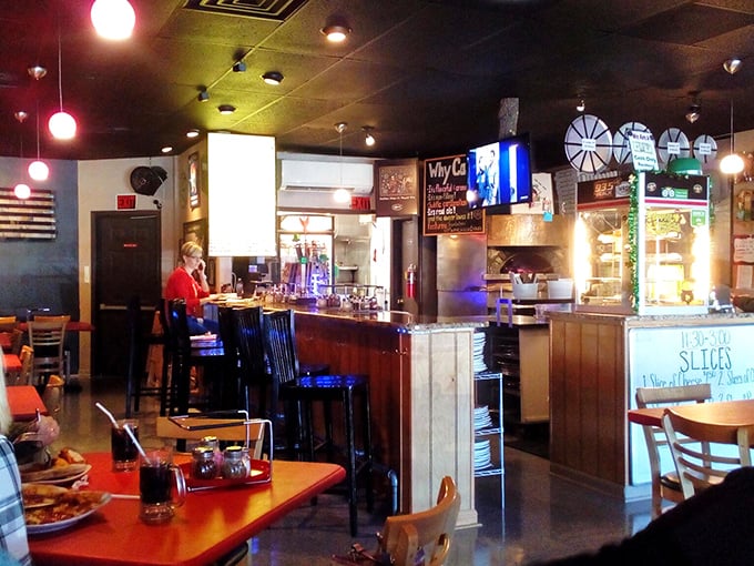 Step into a slice of Americana! This cozy interior feels like your favorite local hangout, with a dash of Italian pizzeria charm.