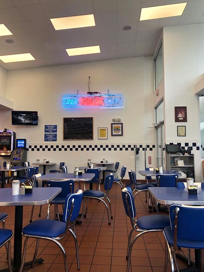 Step into a time machine of comfort food. The classic diner interior promises a feast for both eyes and stomach.