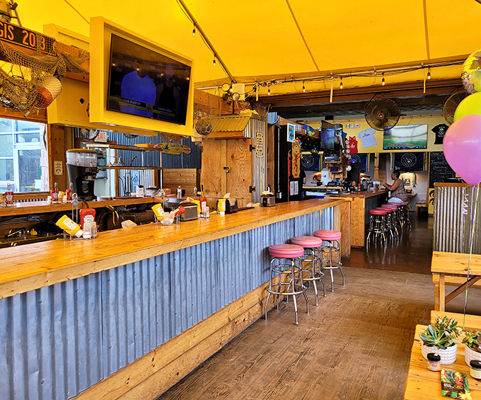 Step inside and you're greeted by a rustic-chic interior that screams "nautical charm meets Midwest cozy." It's like a fisherman's cabin got a HGTV makeover!