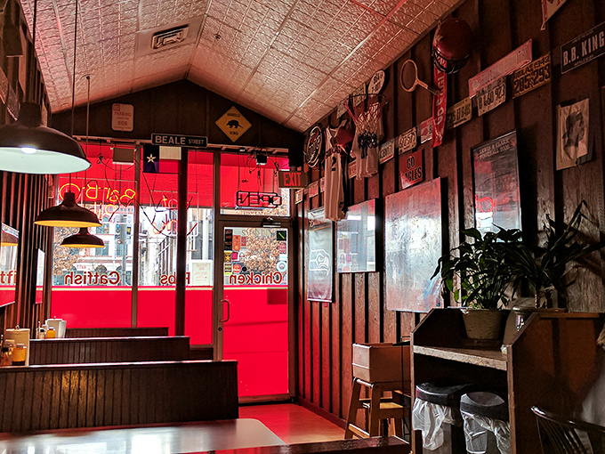 Step inside and you're transported to barbecue heaven. The tin ceiling and eclectic decor create an atmosphere that's part time machine, part flavor portal.