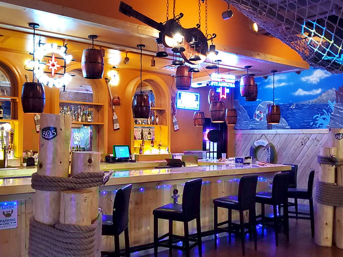 Step inside and you're suddenly in a maritime wonderland. It's like Poseidon's man cave, complete with barrel lights and a touch of tiki charm.