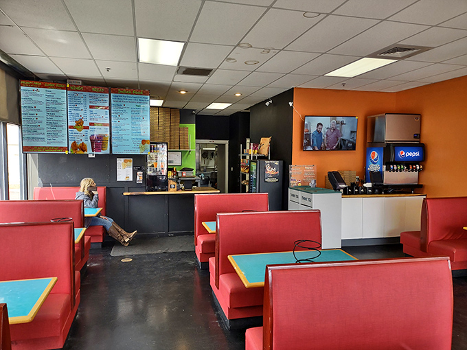 Cozy booths and vibrant colors set the stage for your taste bud tango. It's like your favorite diner got a Bollywood makeover!