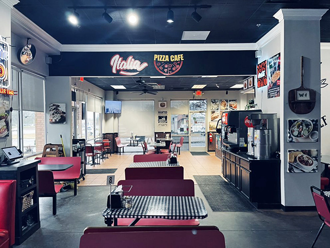 Step into a slice of Italy! The cozy interior, with its checkered tables and pizza-themed decor, sets the stage for carb-loaded adventures.