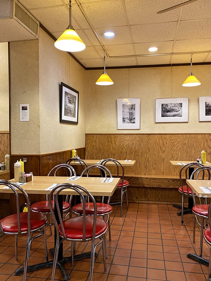 Step into a time capsule of comfort food, where yellow lamps cast a warm glow on memories and meals to come.