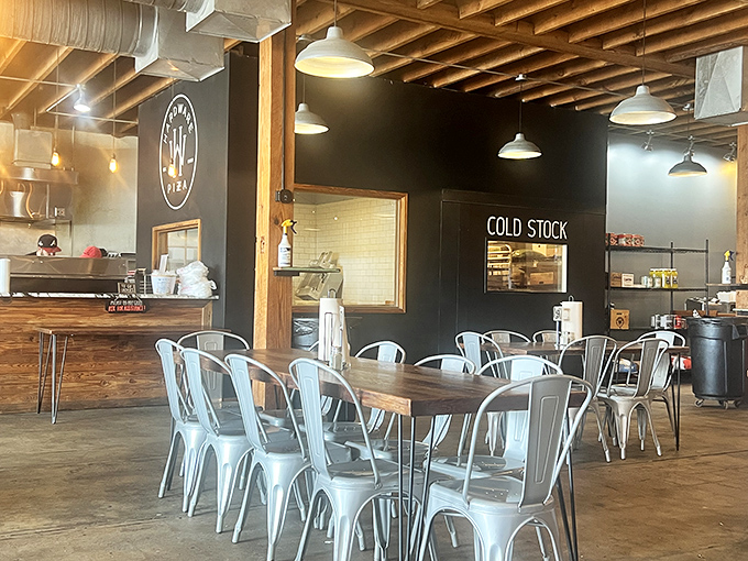 Industrial chic meets pizza paradise. This interior could make even the most ardent HGTV fan swoon, but let's be honest&mdash;we're here for the pies.