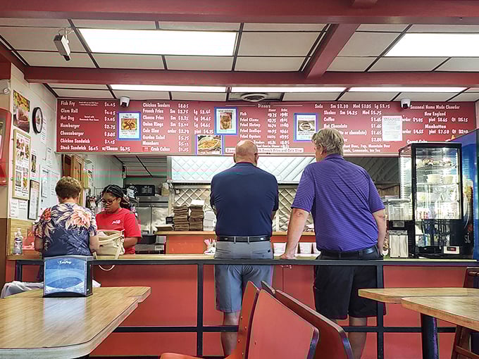 Step up to seafood nirvana! The menu board at Ted's is like a treasure map, guiding hungry adventurers to their next delicious discovery.