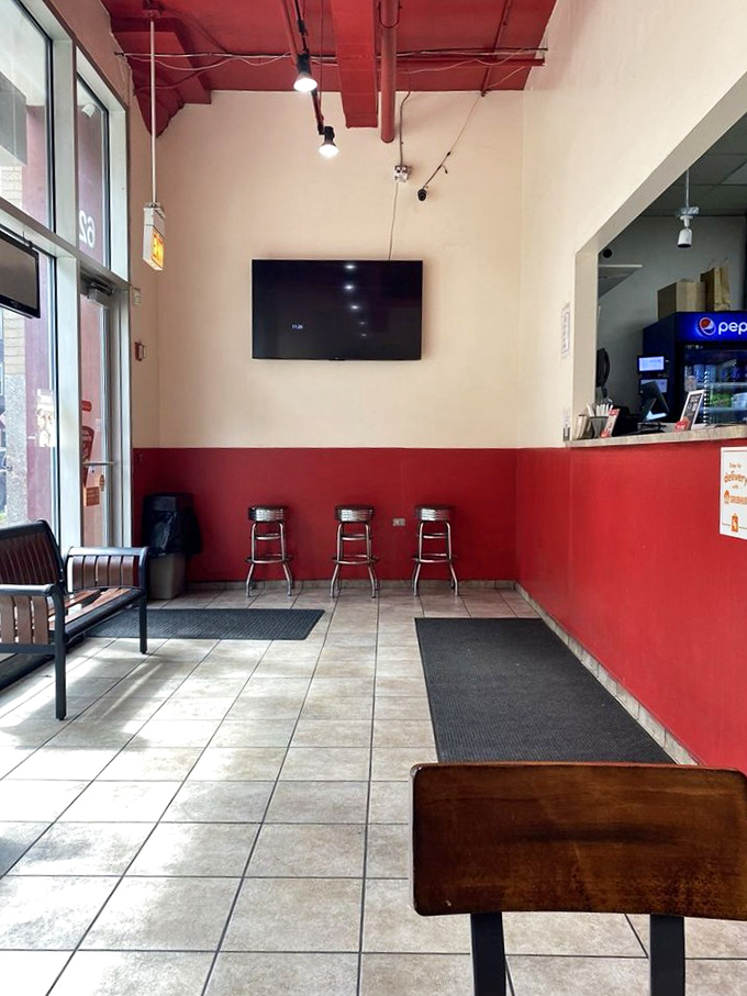 No-frills charm at its finest. Pat's interior is a red-and-white canvas where pizza dreams come true, proving sometimes the best things in life are deliciously simple.