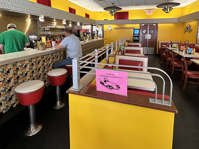 Welcome to burger nirvana! Stanley's sunny interior, with its vibrant yellows and reds, is like a warm hug for your taste buds.