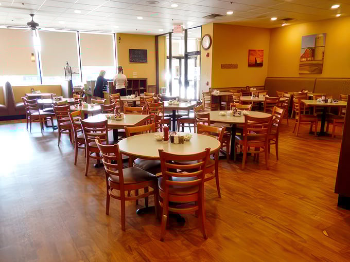 Cozy booths and warm wood tones - it's like your grandma's kitchen got a modern makeover. This is where comfort food meets comfort seating.