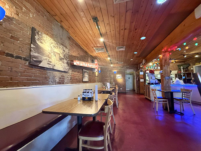 Step into a carnivore's dream! The rustic interior, with its wooden ceiling and brick walls, sets the stage for a finger-licking good time.