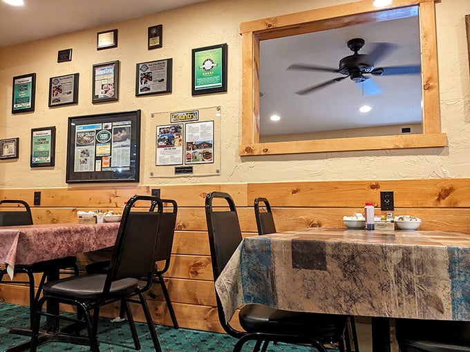 Step into a time capsule of rustic charm. This interior could tell tales of hungry travelers and local legends swapping stories over coffee.