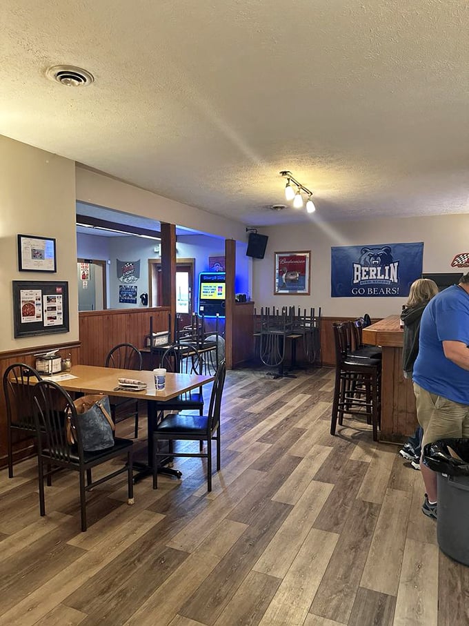 Step into a time capsule of comfort! The interior of Edie's is like your favorite uncle's rec room, if that room served pizza that could make angels weep.