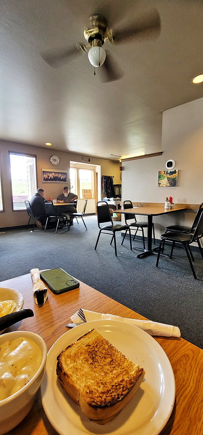 Step inside and travel back in time. This cozy interior whispers tales of countless breakfasts past, with a side of small-town charm.