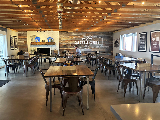 Step into flavor town! This rustic-chic interior is where BBQ dreams come true and diet plans go to die.