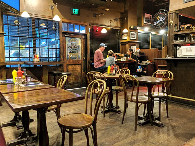 Step into a cozy time machine where classic pub charm meets island vibes. It's like Cheers went on a Hawaiian vacation!