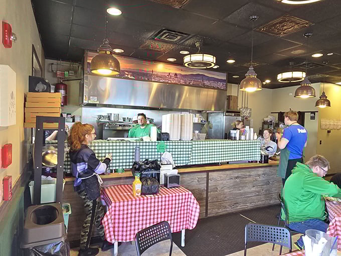 Step into a world where gingham dreams come true. This cozy interior is like a warm hug from your favorite Southern grandma.