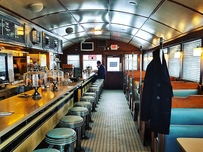 Step inside and feel the nostalgia wash over you. This isn't just a diner; it's a time machine with a side of home fries.