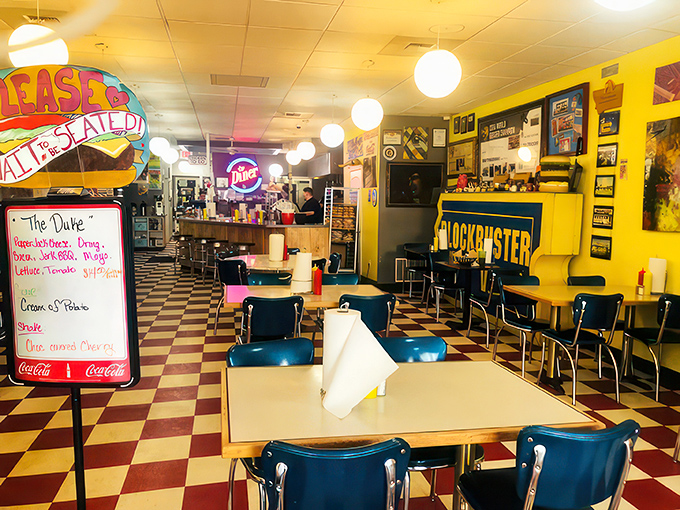Nostalgia overload! This diner's interior is a pop culture explosion, with checkerboard floors and Blockbuster memories. It's where the '50s and '80s collide deliciously.