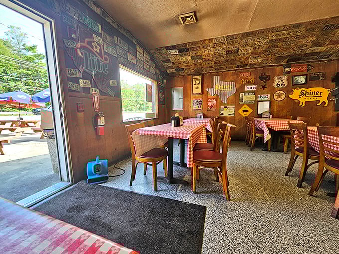 Step inside and you're transported to BBQ heaven. The walls whisper smoky secrets, while checkered tablecloths invite you to dig in.