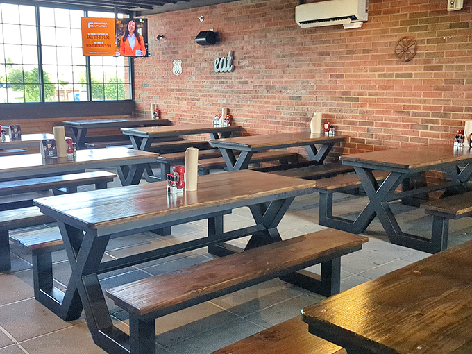 Rustic charm meets meaty paradise. These picnic-style tables are about to witness some serious finger-lickin' goodness.