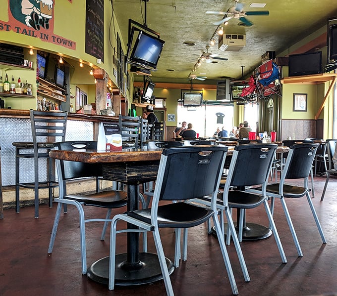 Step inside and you'll find a cozy chaos that screams "local gem." It's like your favorite sports bar had a love child with a Florida swamp shack.