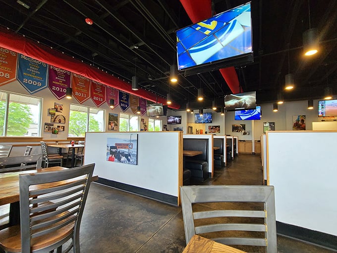 Step into a sports fan's paradise! TVs galore, memorabilia adorning the walls – it's like ESPN and comfort food had a beautiful baby.