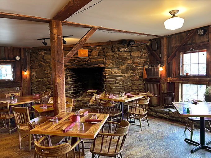 Step inside and feel the warmth of history. With stone walls and wooden beams, it's like dining in a Norman Rockwell painting come to life.