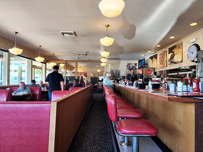 Step into a time capsule of comfort. Red vinyl booths and counter stools await, ready to cradle you through a feast fit for The Breakfast Club.