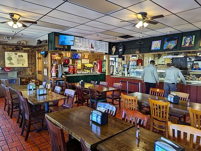 Where barbecue dreams come true &ndash; wooden tables, no-nonsense chairs, and the promise of smoky delights just steps away.